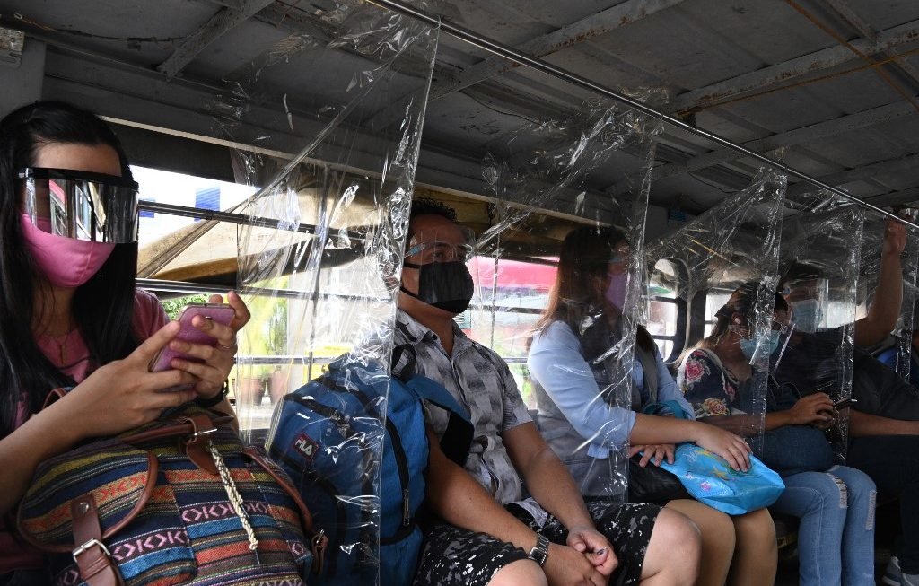 Strict Mask, Visor Rules Make Philippine Commuters Sweat