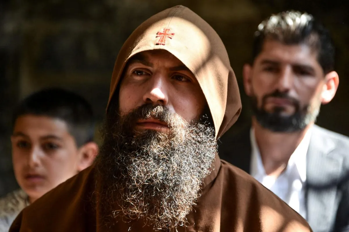 Iraklı Hristiyanlar ayaklarıyla yeni bir çıkış kitabı yazıyorlar